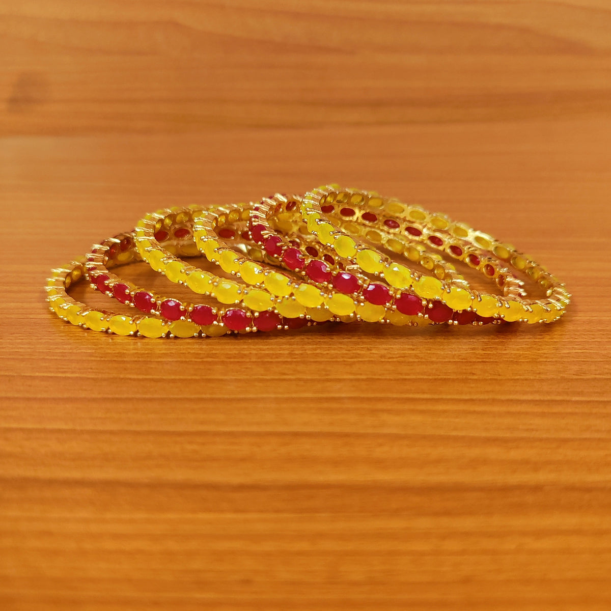 YELLOW & RED COLOUR OVAL SHAPED SINGLE LINE BANGLES – Sanvi Jewels